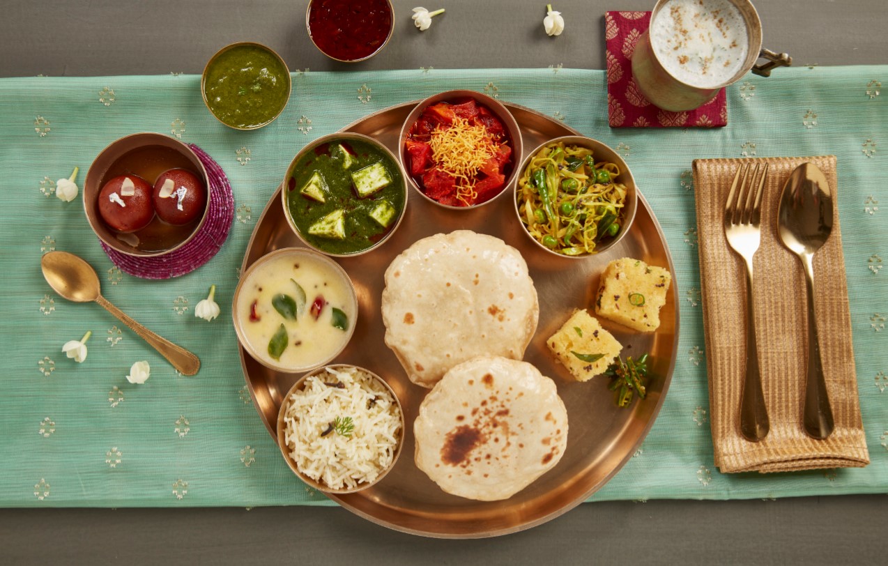 Relish Gujarati Thali For Lunch with Your Family
